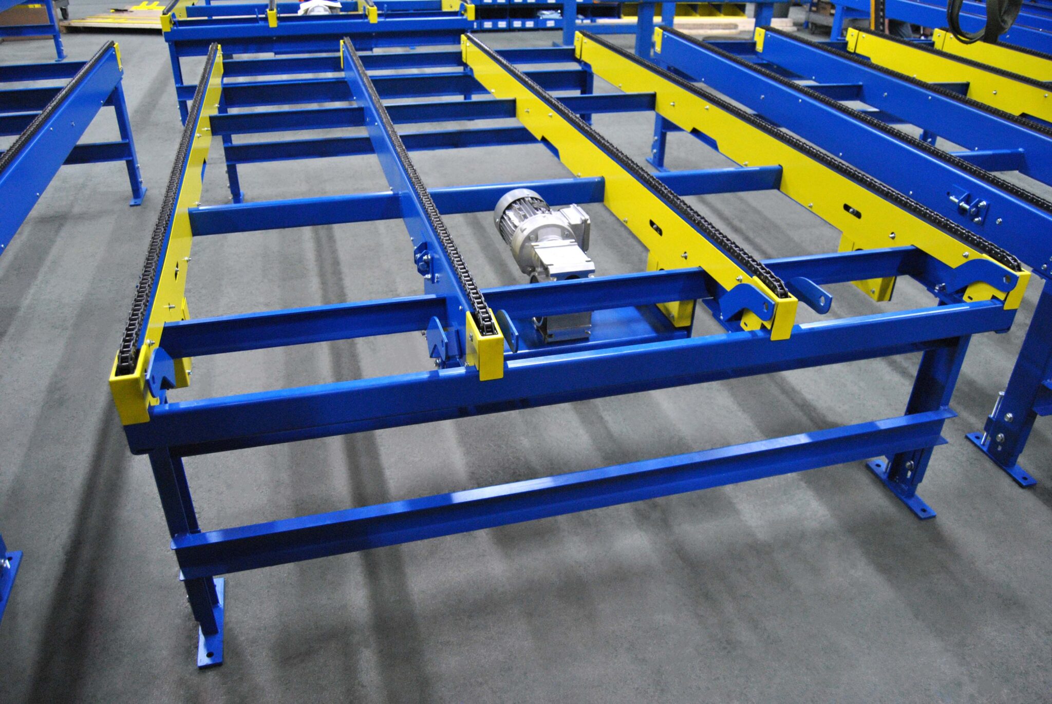 Multi-Strand Chain Conveyor - Rolmaster Conveyors